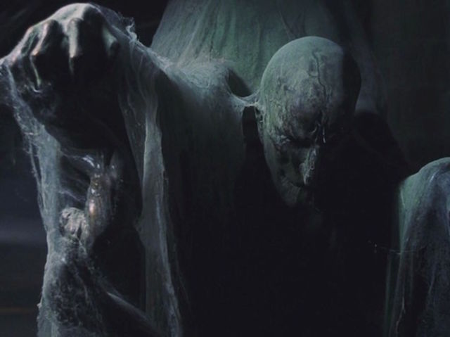 What is the name of the one-eyed witch who guards the passageway ...